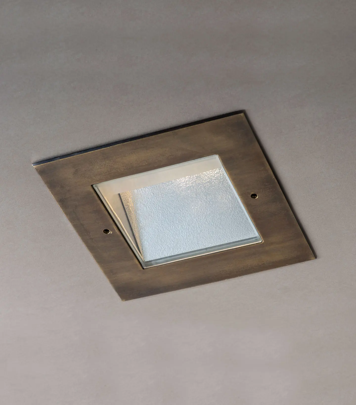 Recessed square asymmetrical downlight luminaire
